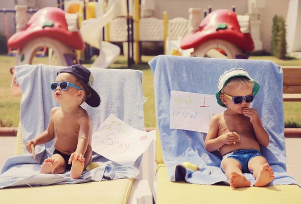 Cool and cute boy sunbathing Stock Photo by ©Sashka_Lenka 130685684