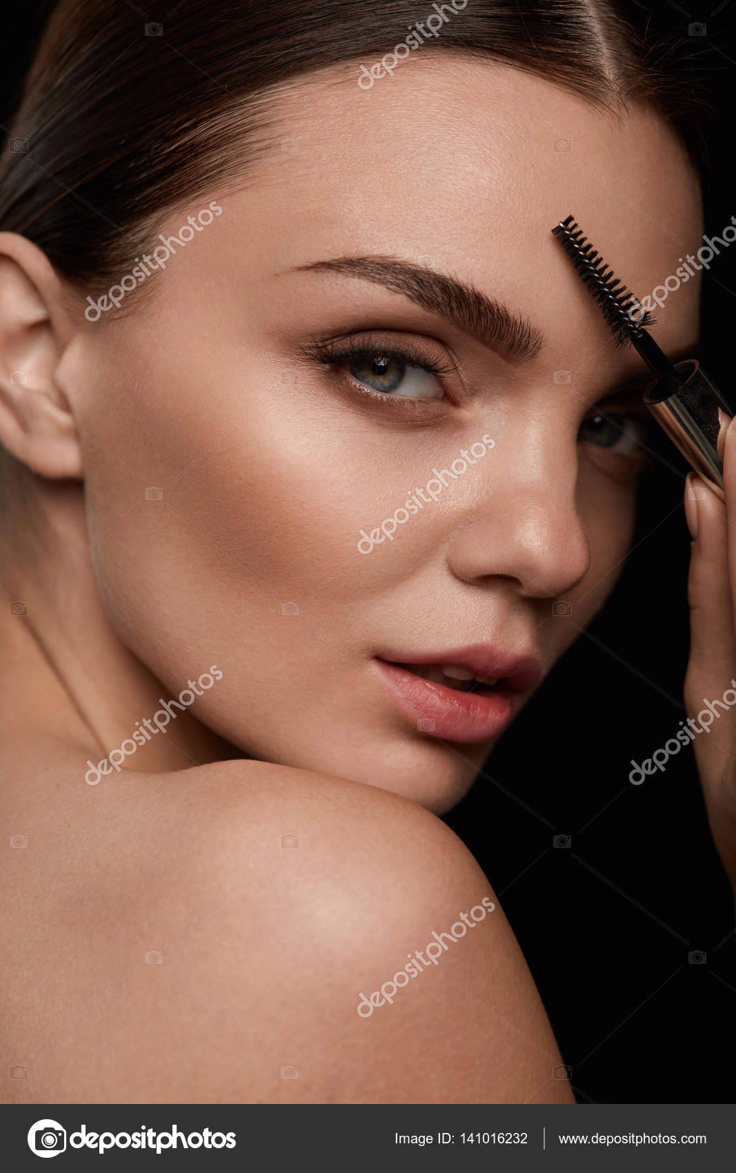 Woman Face With Beautiful Eyebrows And Professional Makeup Stock Photo ...