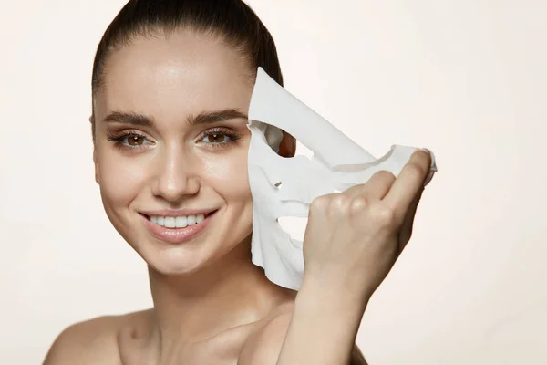 Woman Beauty Face. Young Female Removing Mask From Facial Skin Stock ...