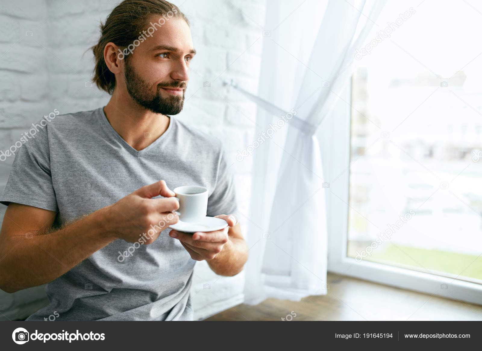 Person Drinking Coffee At Home