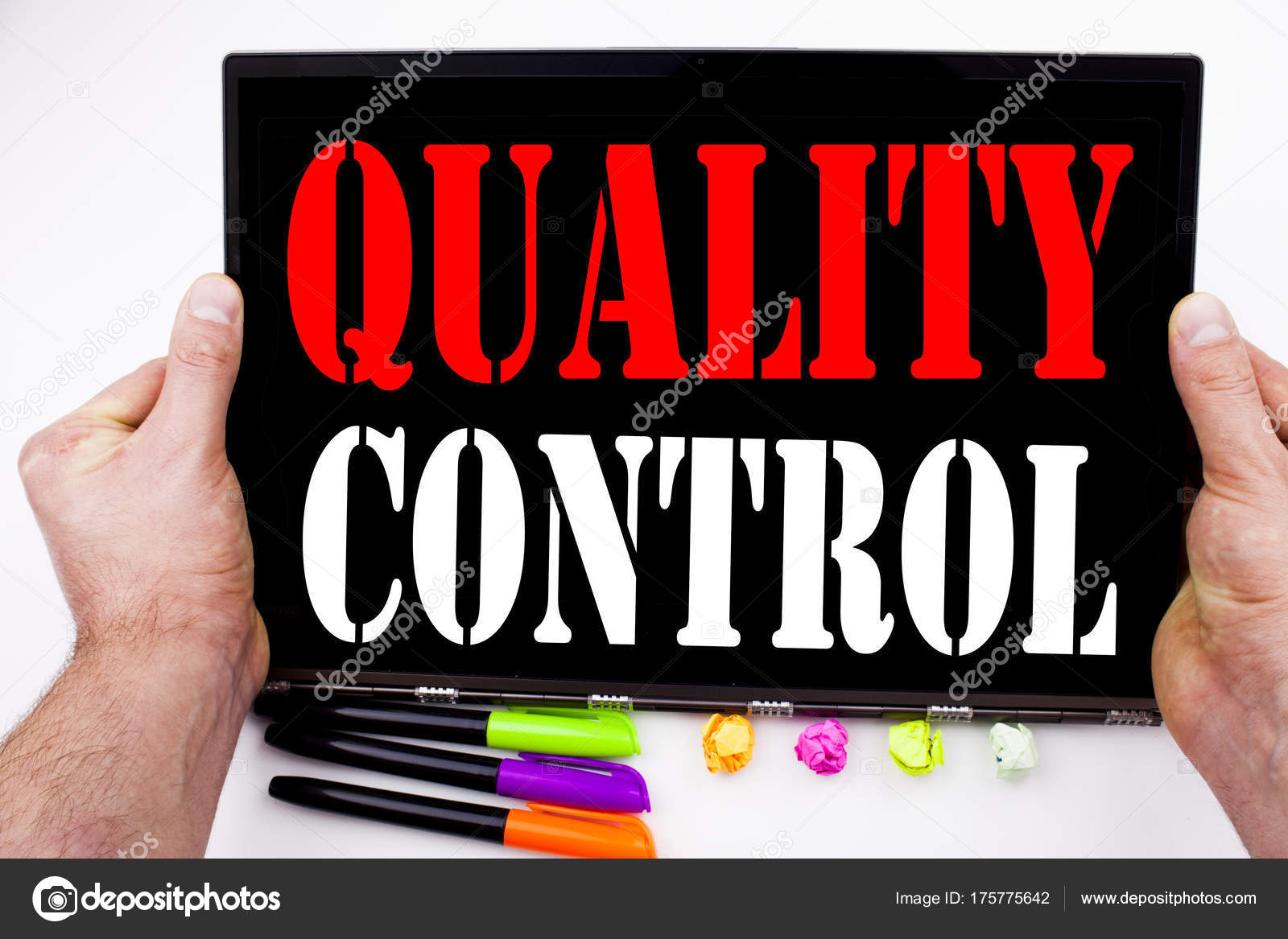Quality Control text written on tablet, computer in the office with ...
