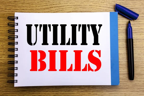 Handwriting Announcement text showing Utility Bills. Business concept ...