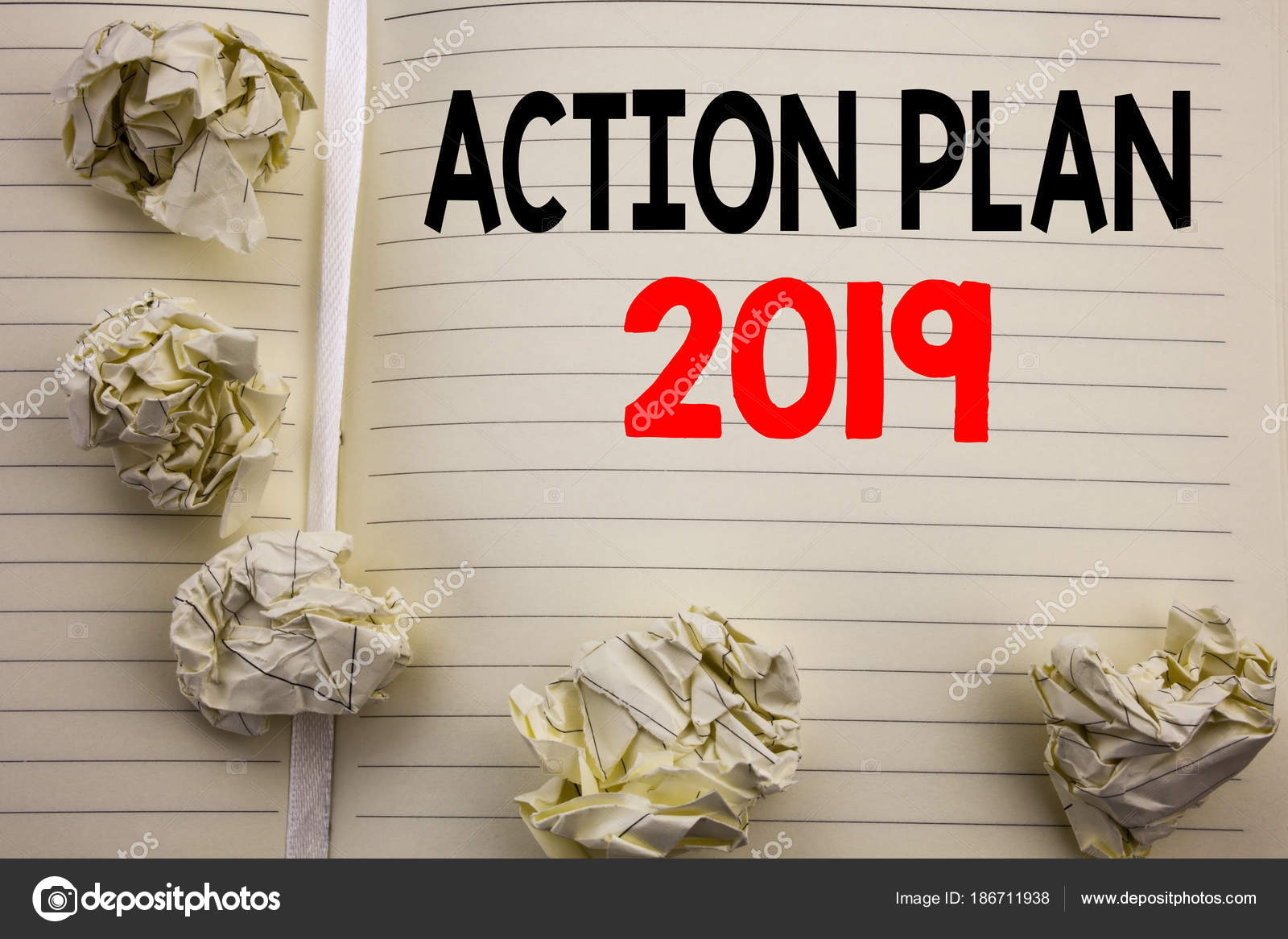 Handwritten text showing Action Plan 2019. Business concept writing for ...