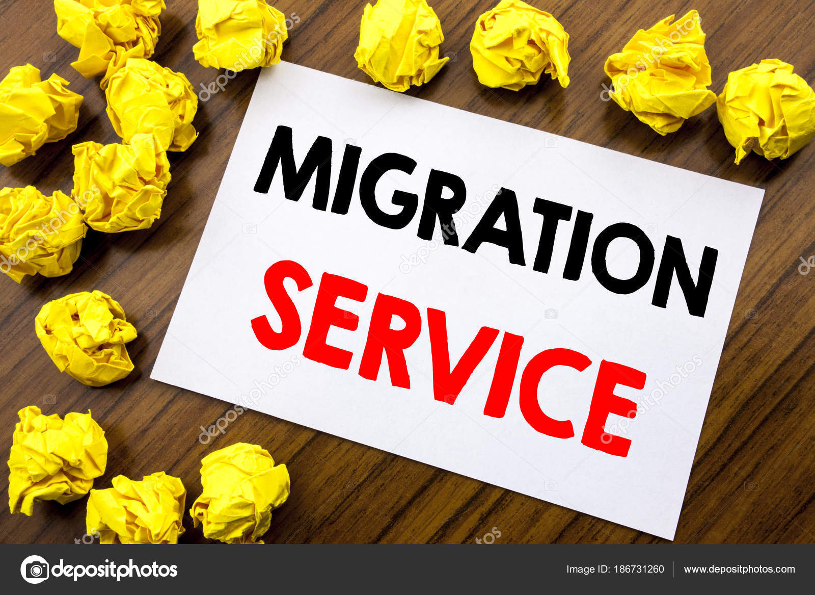 Handwritten text showing word Migration Service. Business concept ...