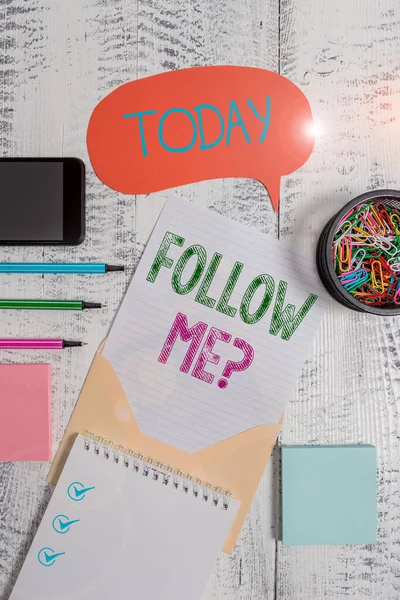 Text sign showing Follow Me Question. Conceptual photo go or come after ...