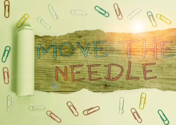 Writing note showing Move The Needle. Business photo showcasing Make a ...