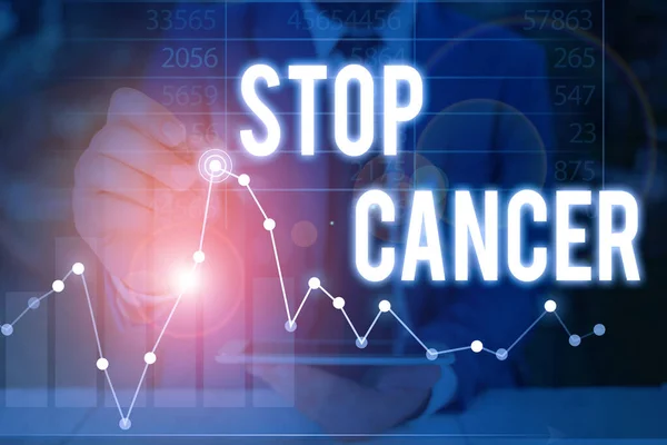 Handwriting text Stop Cancer. Concept meaning prevent the uncontrolled ...