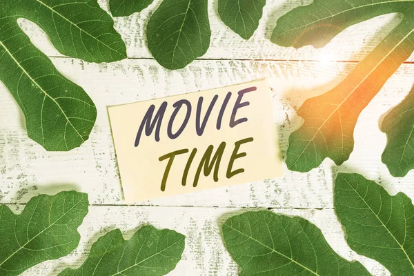 Writing note showing Movie Time. Business photo showcasing the ...