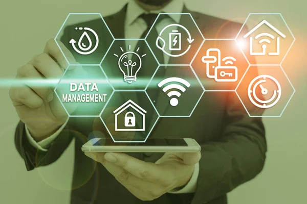 Writing note showing Data Management. Business concept for disciplines ...