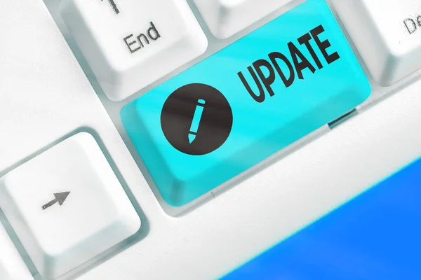 Word writing text Update. Business concept for by adding new information or making corrections ...