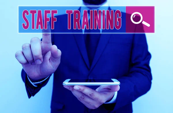 Writing note showing Staff Training. Business photo showcasing program ...