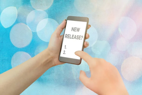 Handwriting text New Release Question. Concept meaning asking about ...