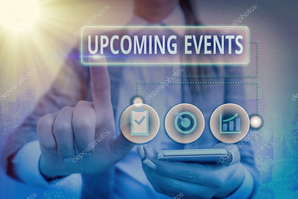 Escribiendo una nota que muestra los próximos eventos. Foto de negocios ...