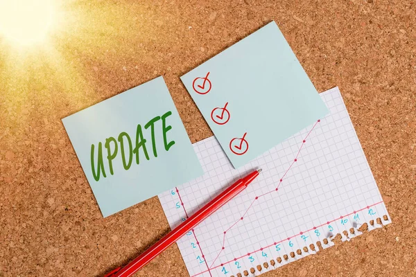 Text sign showing Update. Conceptual photo by adding new information or ...