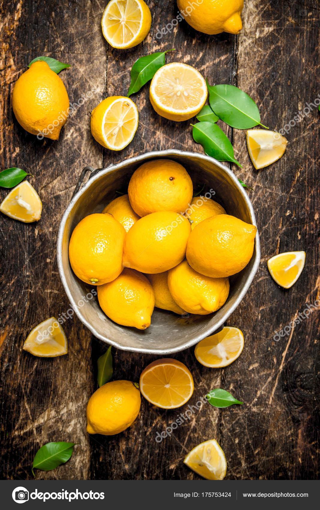 Ripe lemons in the old bucket. — Stock Photo © srapulsar38 #175753424