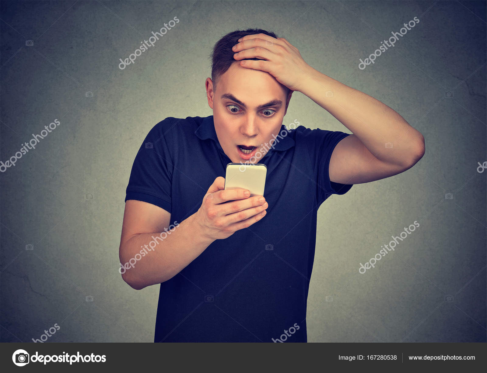 Shocked Man Looking At His Mobile Phone Seeing Bad News Reading Text