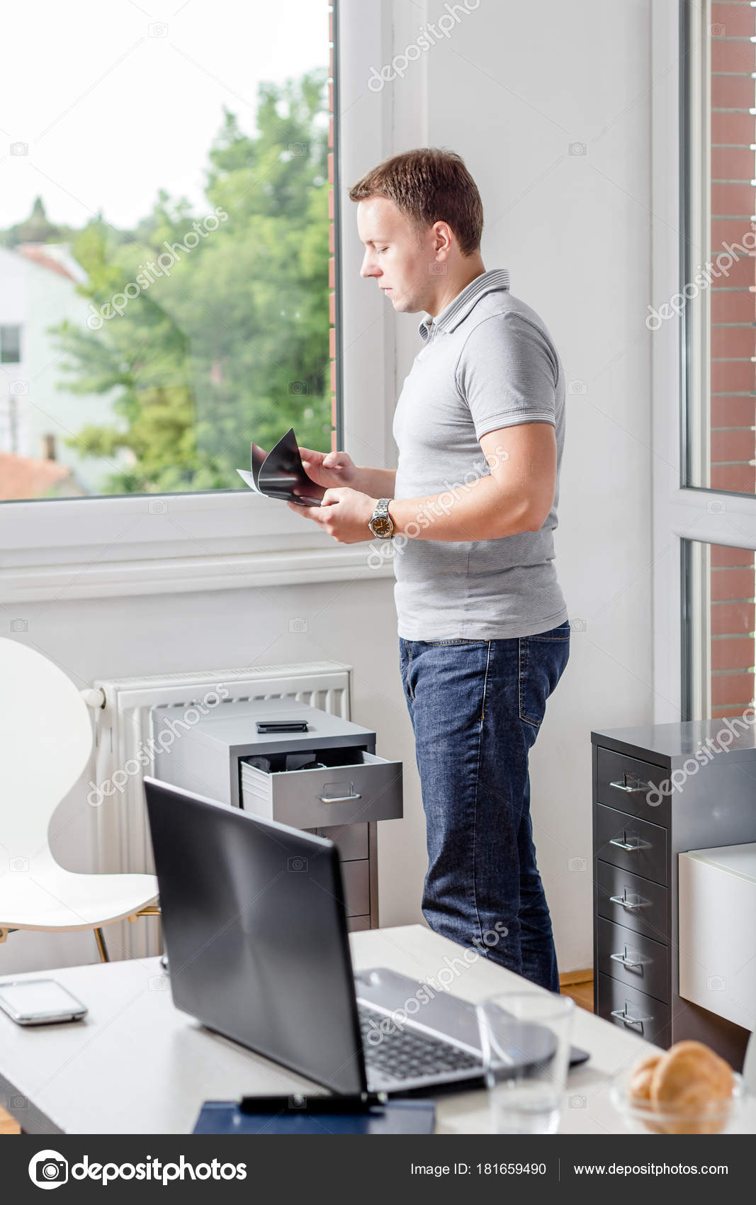 Business Man Reading Brochure Window Office Stock Photo by ©Kerkezz ...