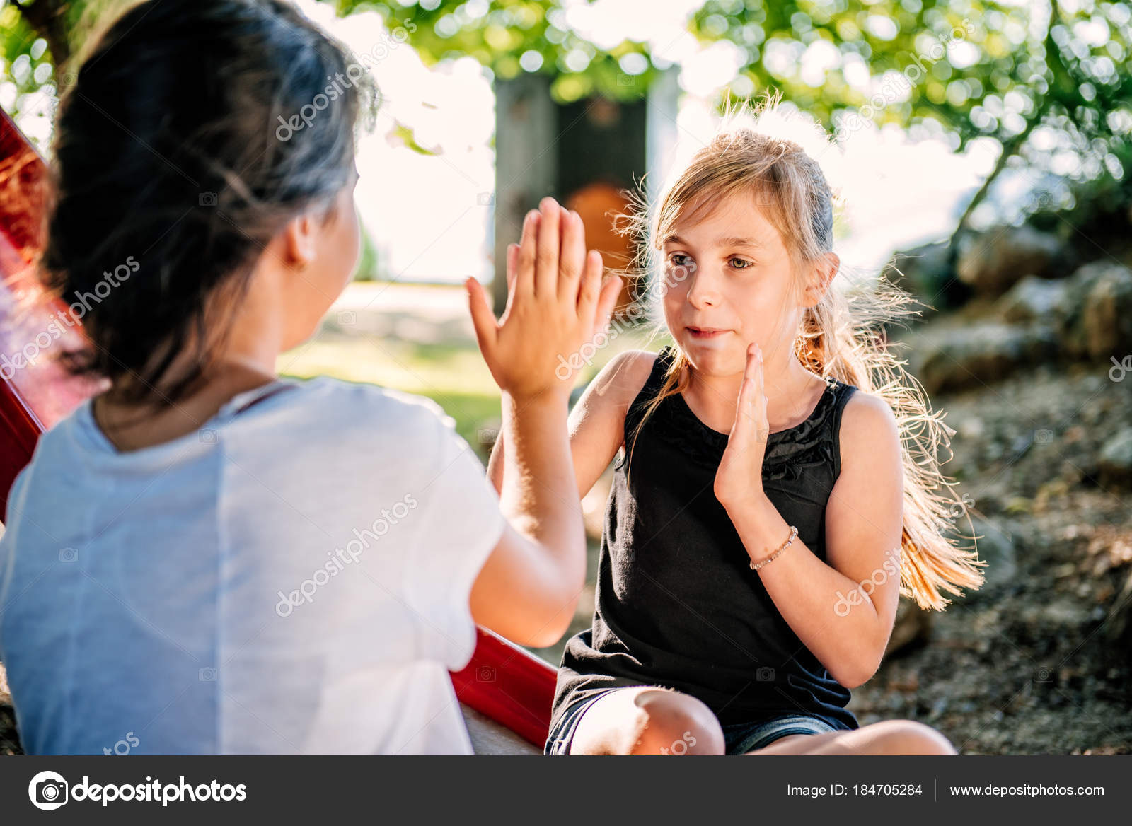 Two Ladies Clapping Hands