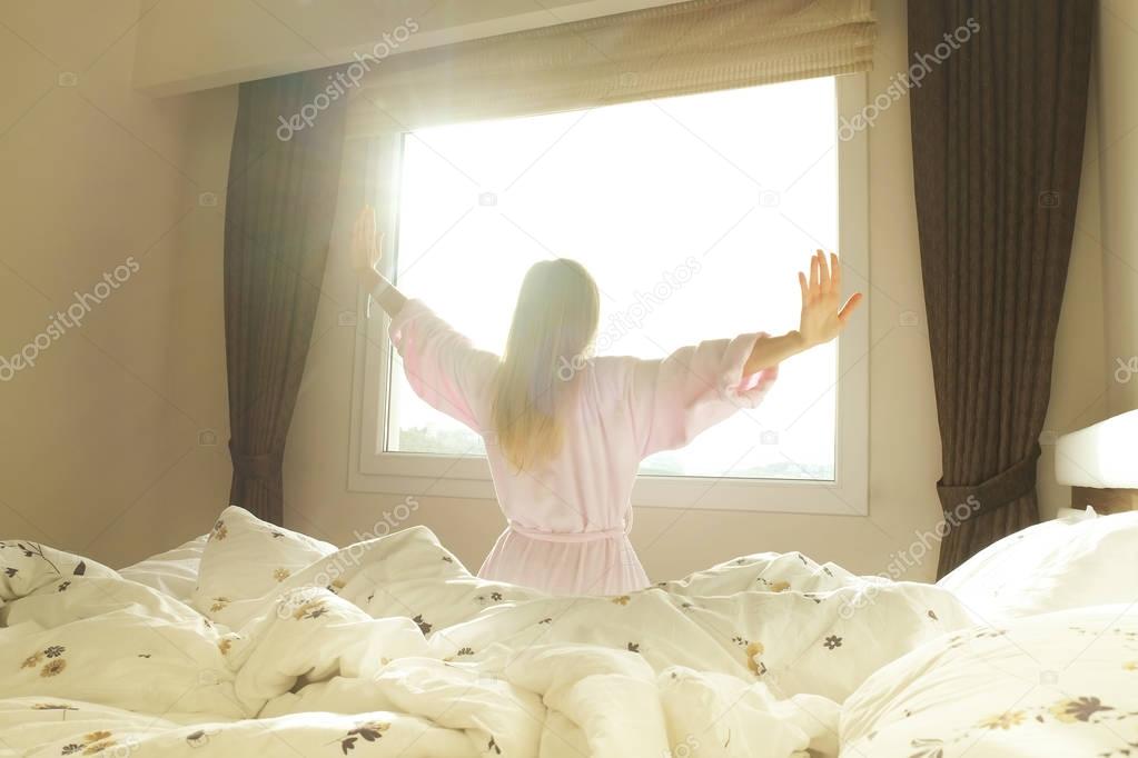 Big spacey hotel room full of sunlight and sun beams. Optimistic start ...