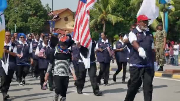 Kids in bee masking join the merdeka parade at Padang Pemuda Merdeka ...