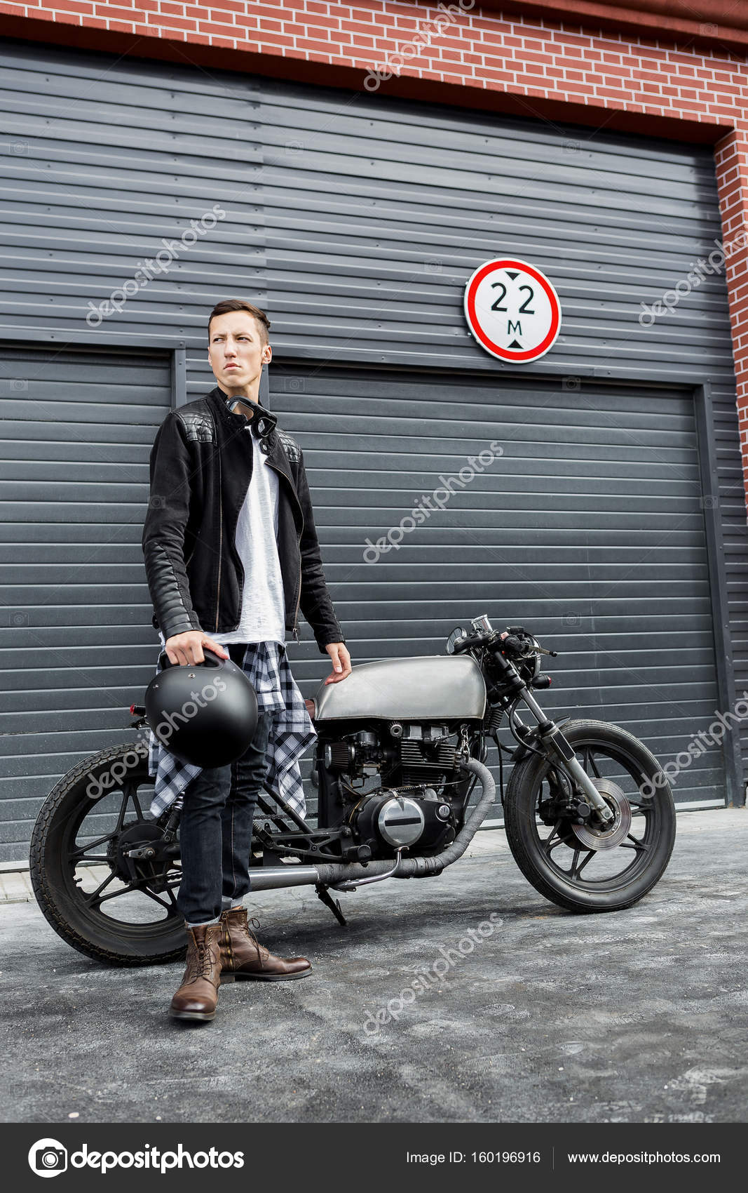 Brutal man near his cafe racer custom motorbike. — Stock Photo ...