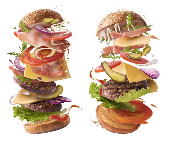 Delicious burger with flying ingredients isolated on white backg ...