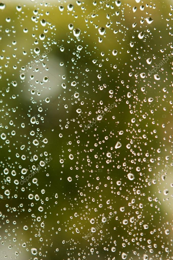 Glass with drops of rain water — Stock Photo © Gelpi #125416698