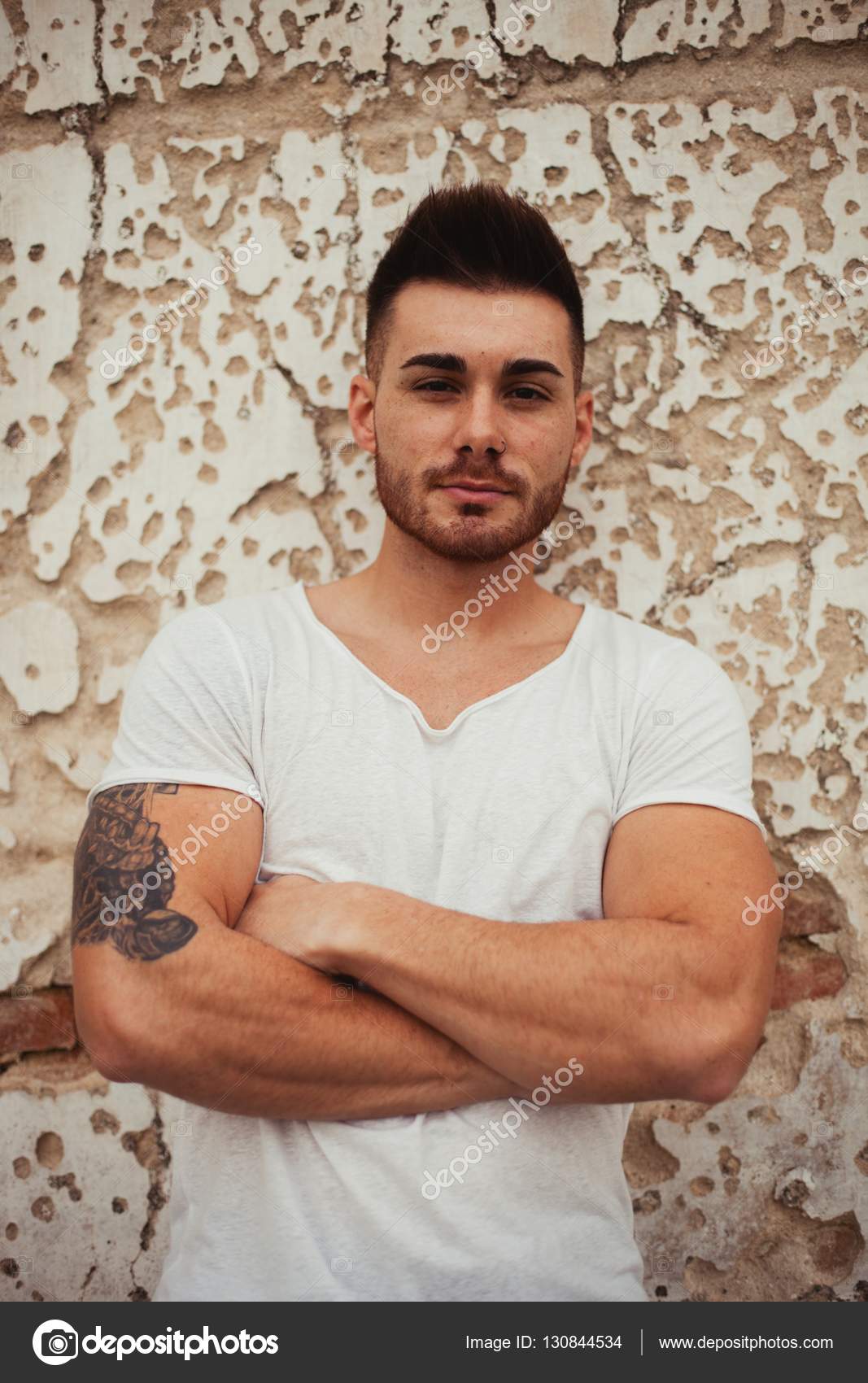 Man near abandoned house Stock Photo by ©Gelpi 130844534