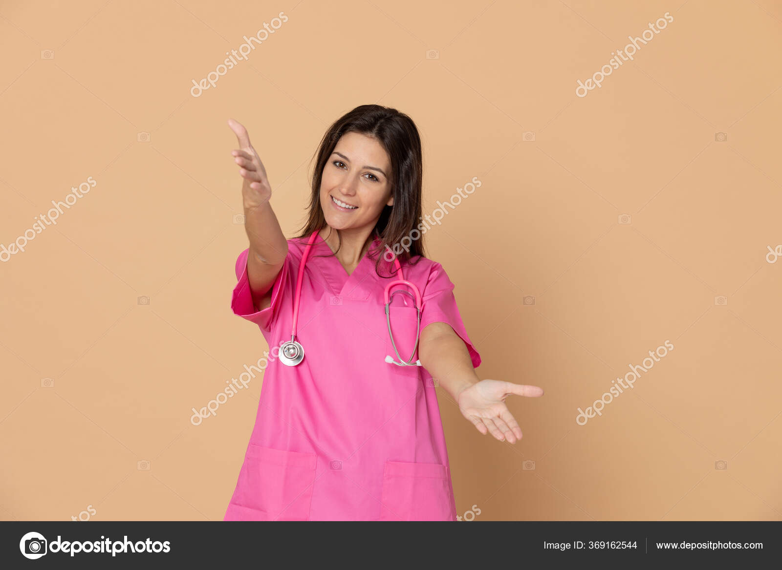 Young Doctor Wearing Pink Uniform Yellow Background Stock Photo by ...