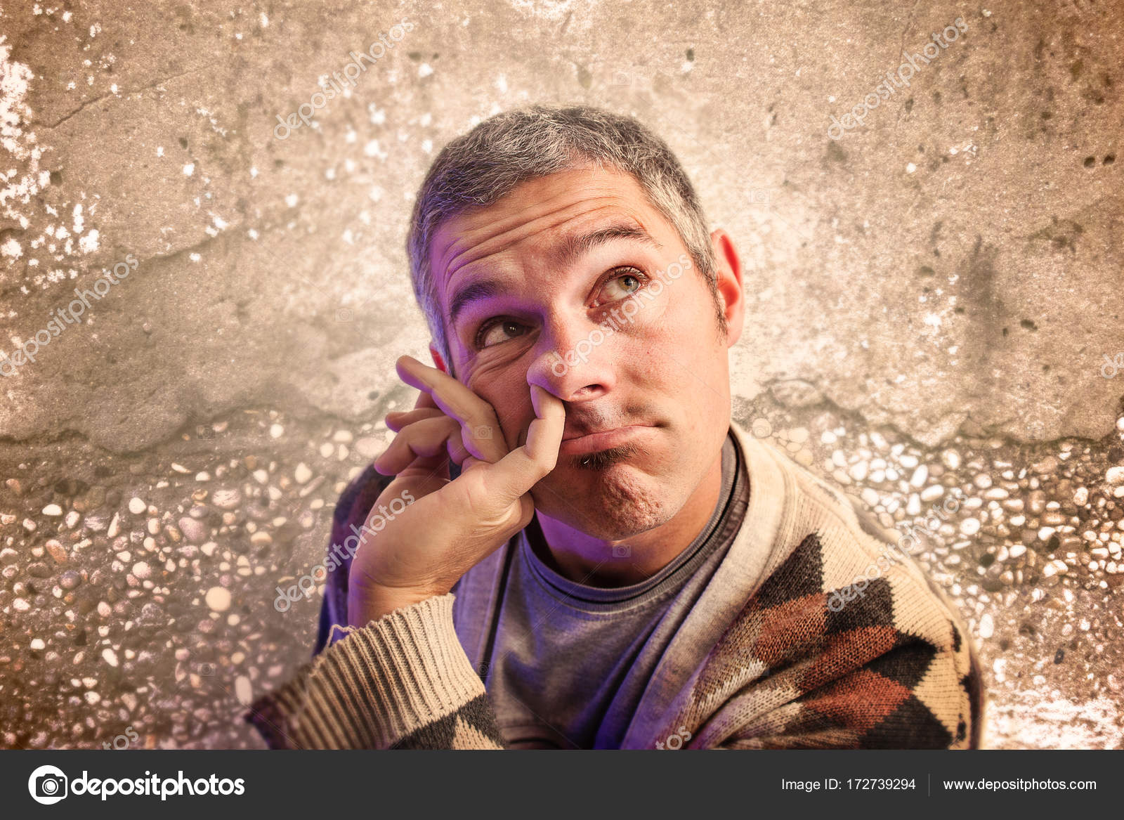 Man with a finger in his nose, ridiculous expression — Stock Photo ...