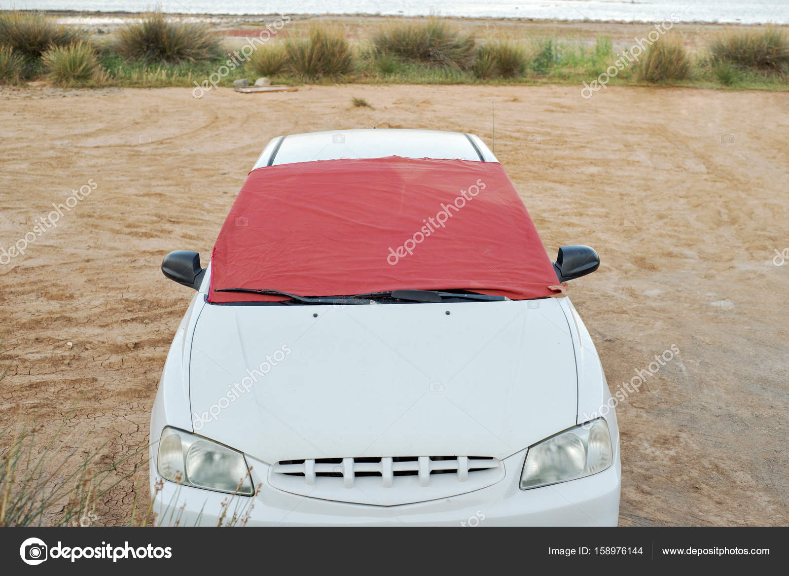 Windshield of white car covered by piece of fabric — Stock Editorial ...