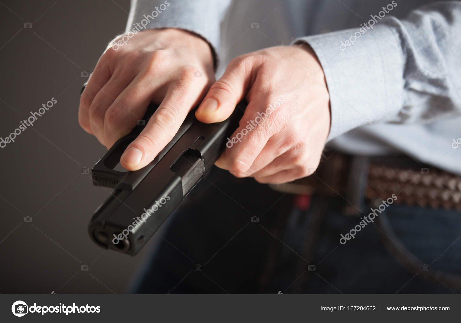 Man reloading pneumatic gun — Stock Photo © zestmarina #167204662