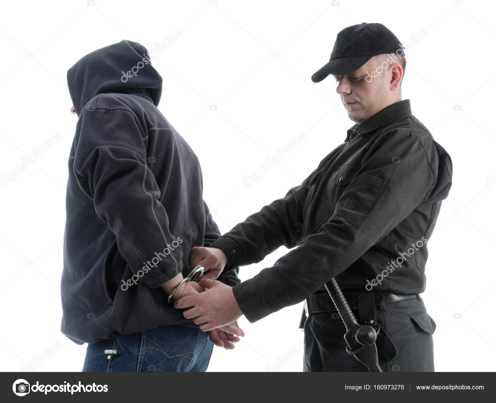 Man handcuffed by policeman Stock Photo by ©pryzmat 160973276