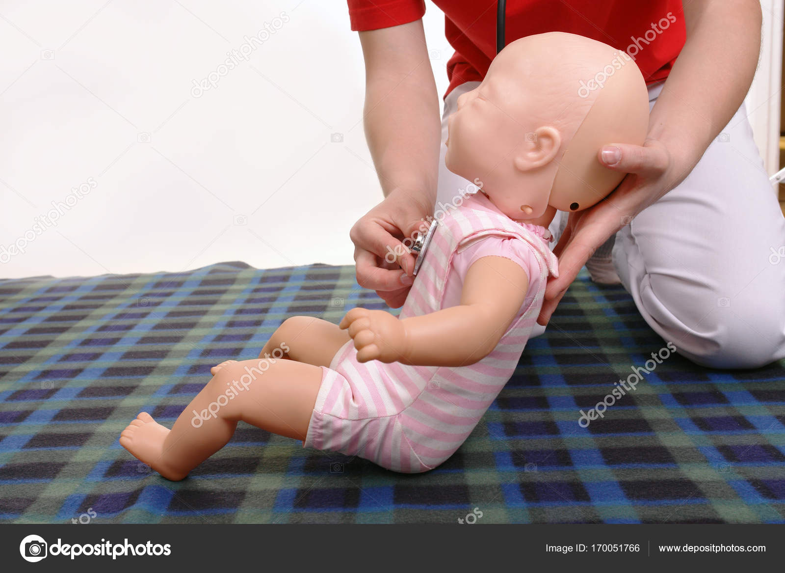 Infant medical examination demonstration Stock Photo by ©pryzmat 170051766