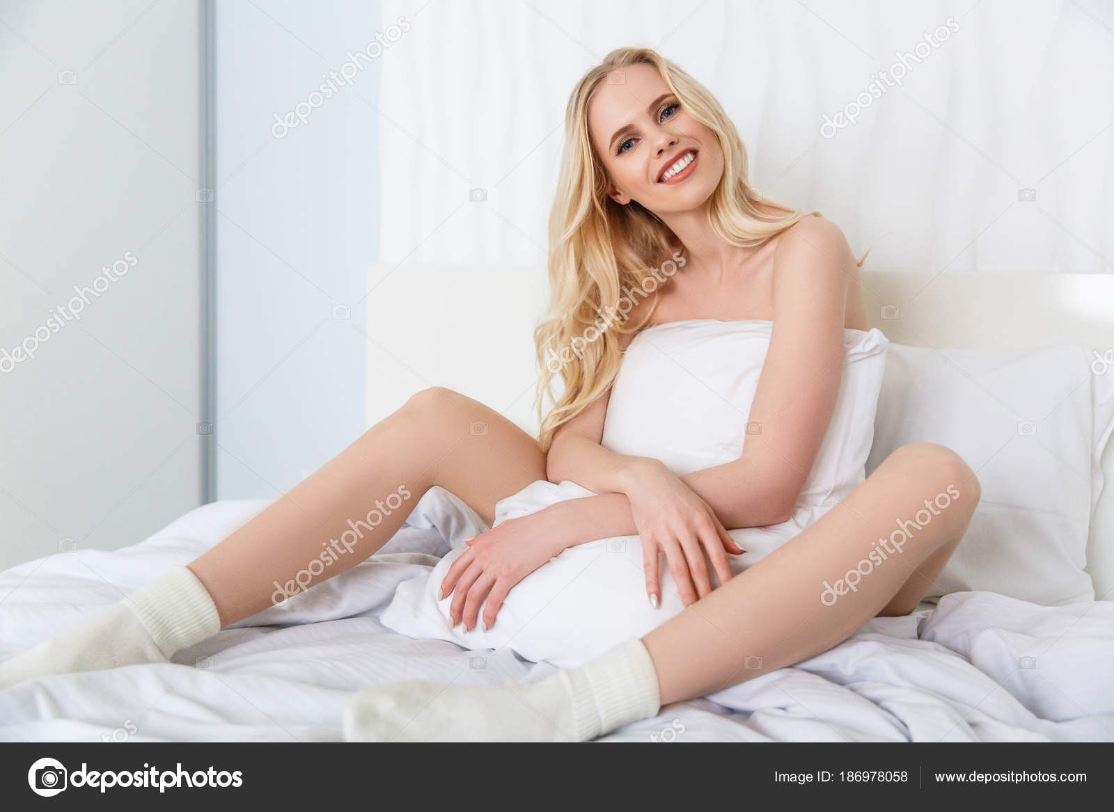 Beautiful Happy Blonde Girl Sitting Bed Smiling Camera — Stock Photo ... Beautiful Happy Blonde Girl Sitting Bed Smiling Camera — Stock Photo ...