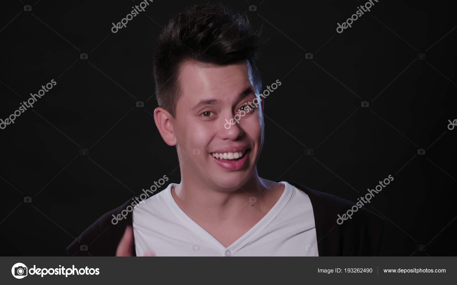 A Man Mimicing Against a Black Background Stock Photo by ©profstocktv ...