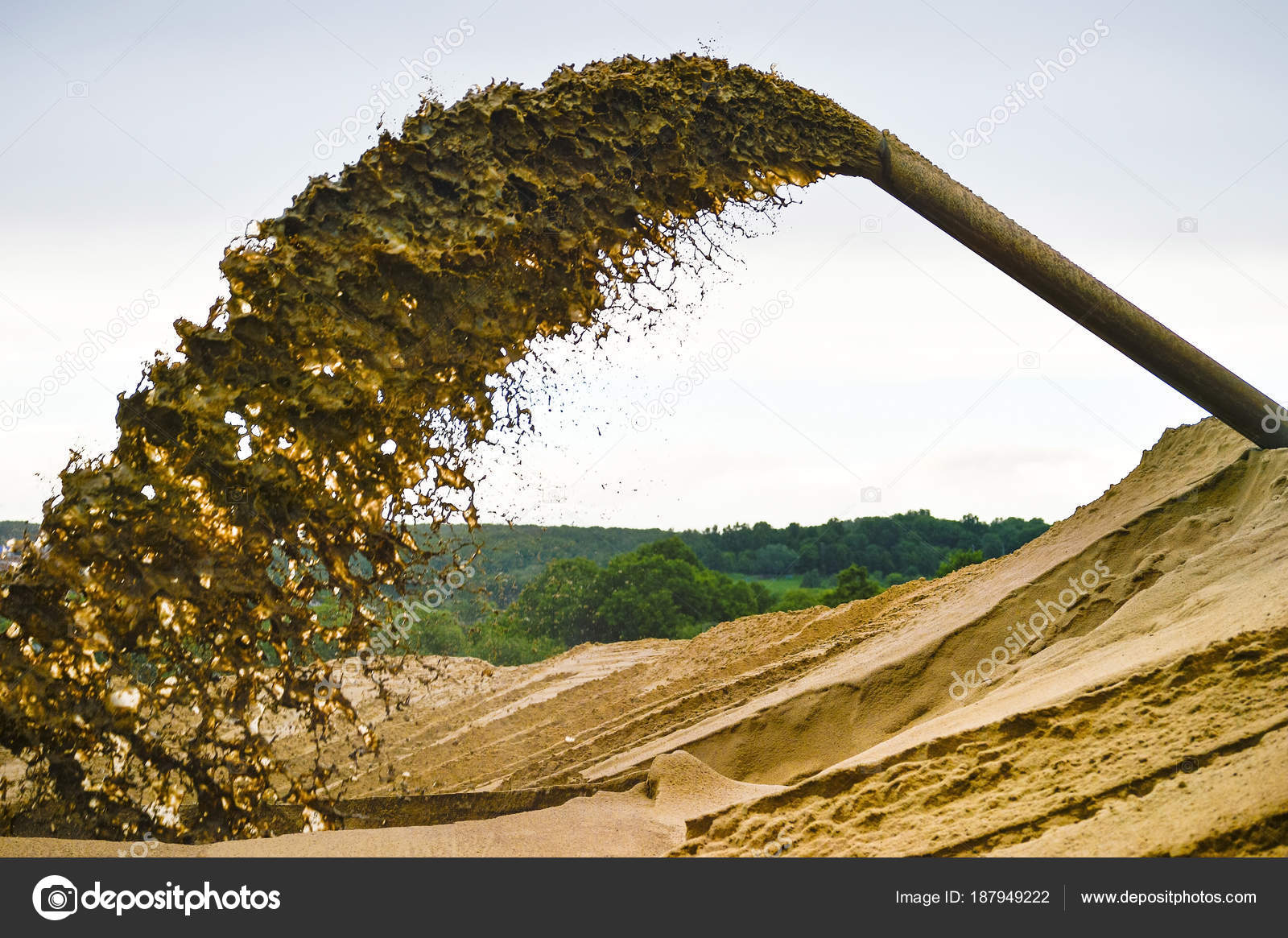 Industrial sand mining pumping out the pumping station. Background ...