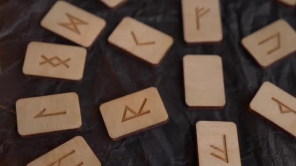 Wooden rune wheel. runic layout and candles, 4k, slow-motion shooting ...