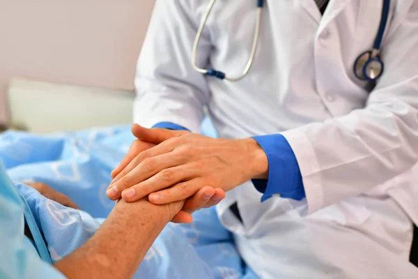 Concept of healing care, The doctor is healing old woman. - Stock Image ...