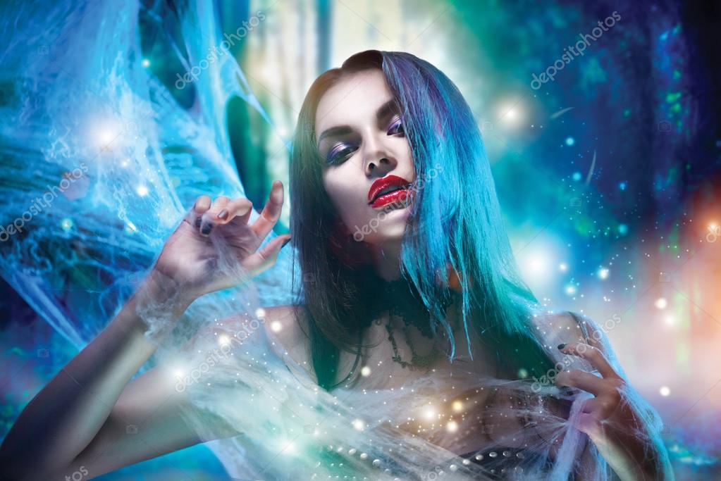 Beautiful Halloween witch portrait. Stock Photo by ©Subbotina 127207820