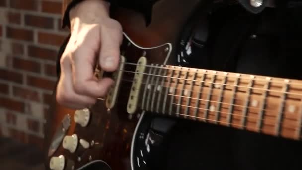 Playing on electric guitar Stock Photo by ©artjazz 4051176