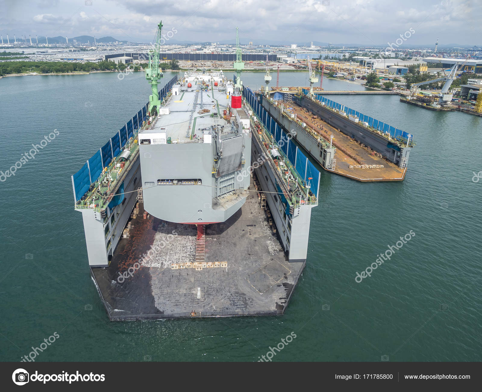 Aerial view shipyard have crane machine and container ship in gr Stock ...