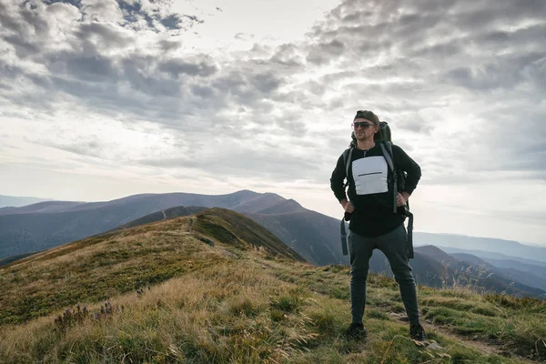 Hiking man or trail runner in mountains, inspirational landscape ...