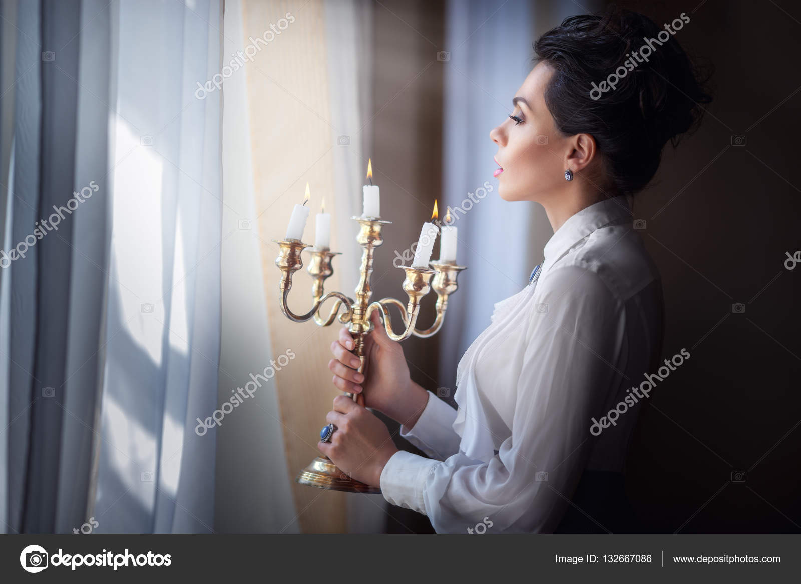 Girl, candle, window, light, Stock Photo by ©fantasystudio 132667086
