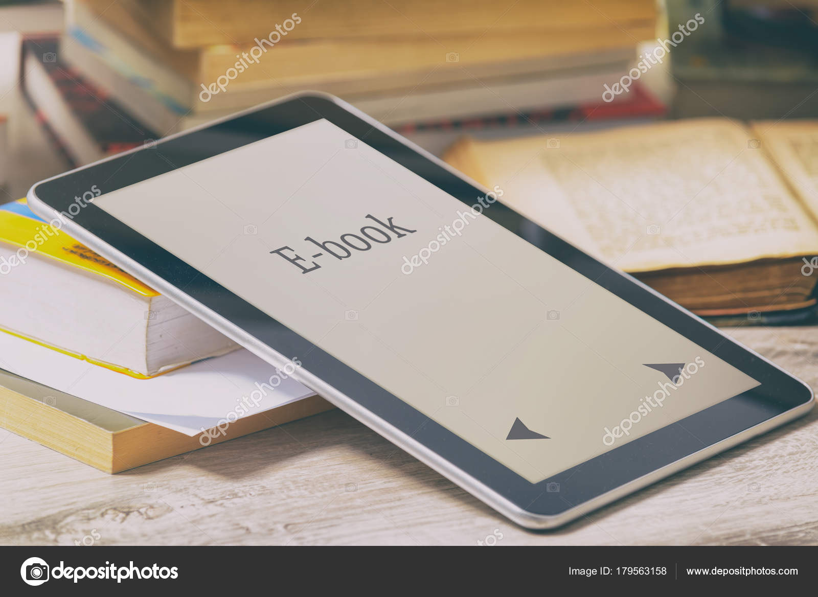 Modern ebook reader and books Stock Photo by ©Amaviael 179563158