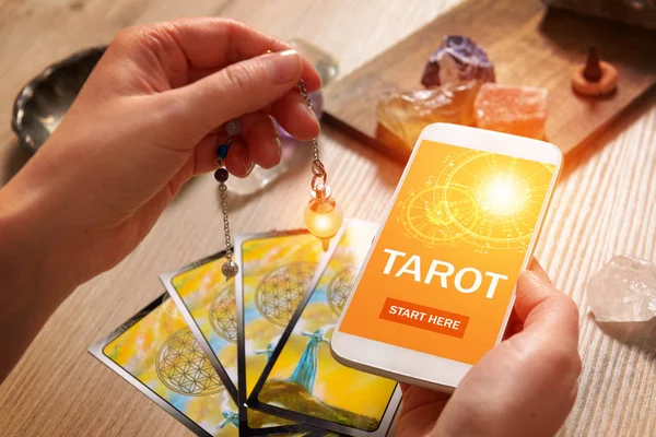 Tarot cards and mobile phone — Stock Photo © Amaviael #184237484