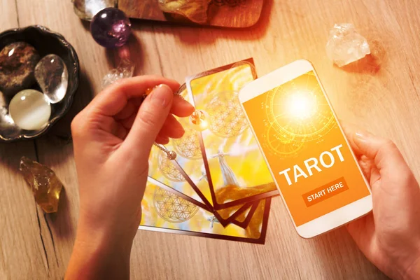 Tarot cards and mobile phone — Stock Photo © Amaviael #184237484