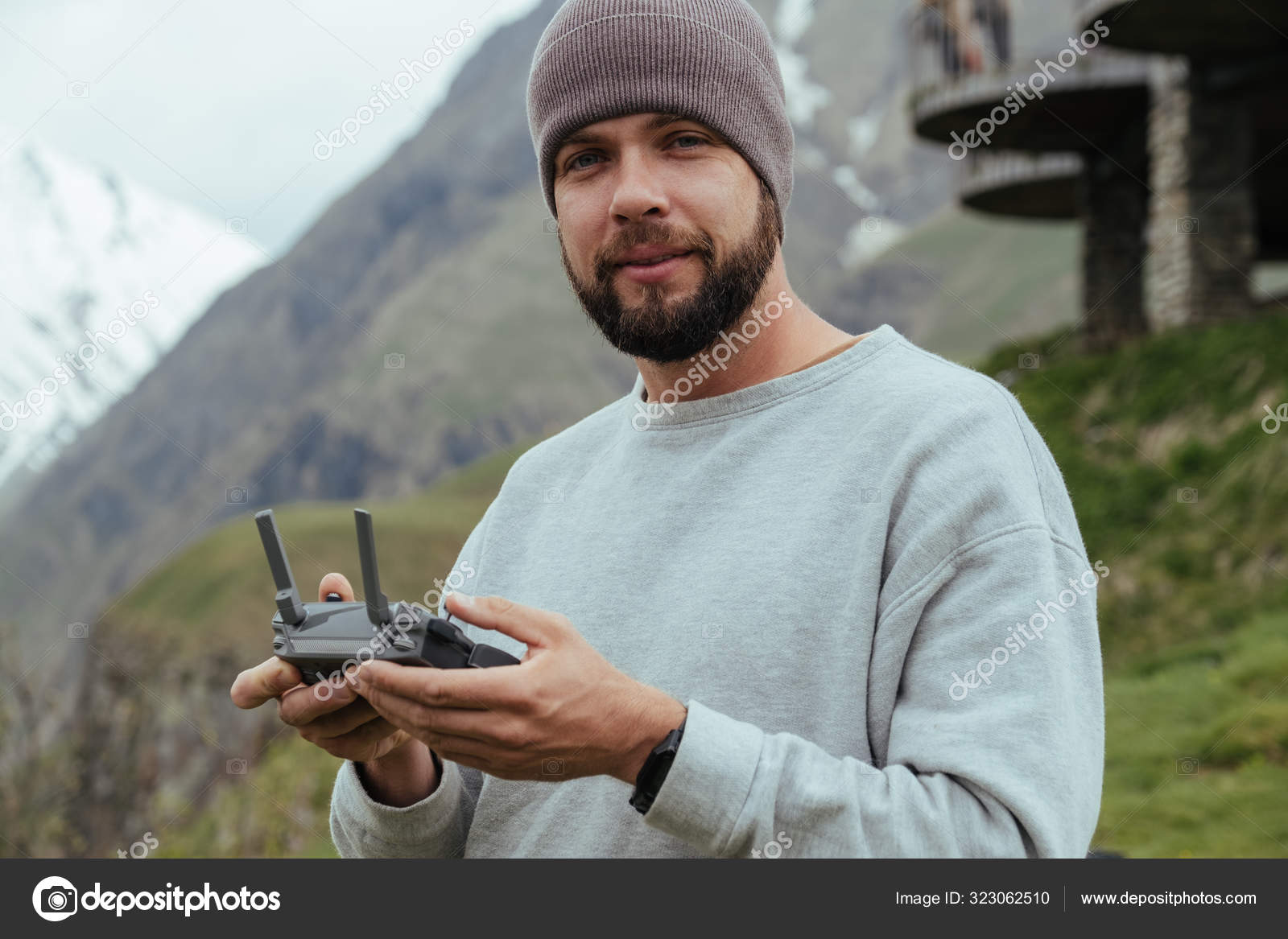 Drone operator pilot with beard in Georgian mountains Stock Photo by ...