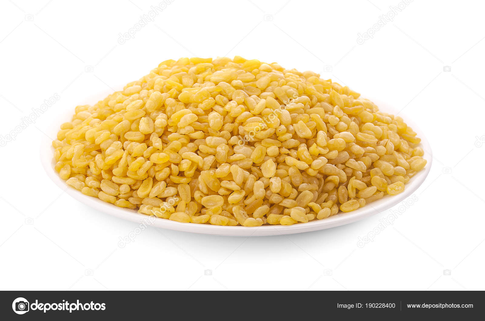 Hulled-split monk bean in wooden spoon isolated on white backgro ...