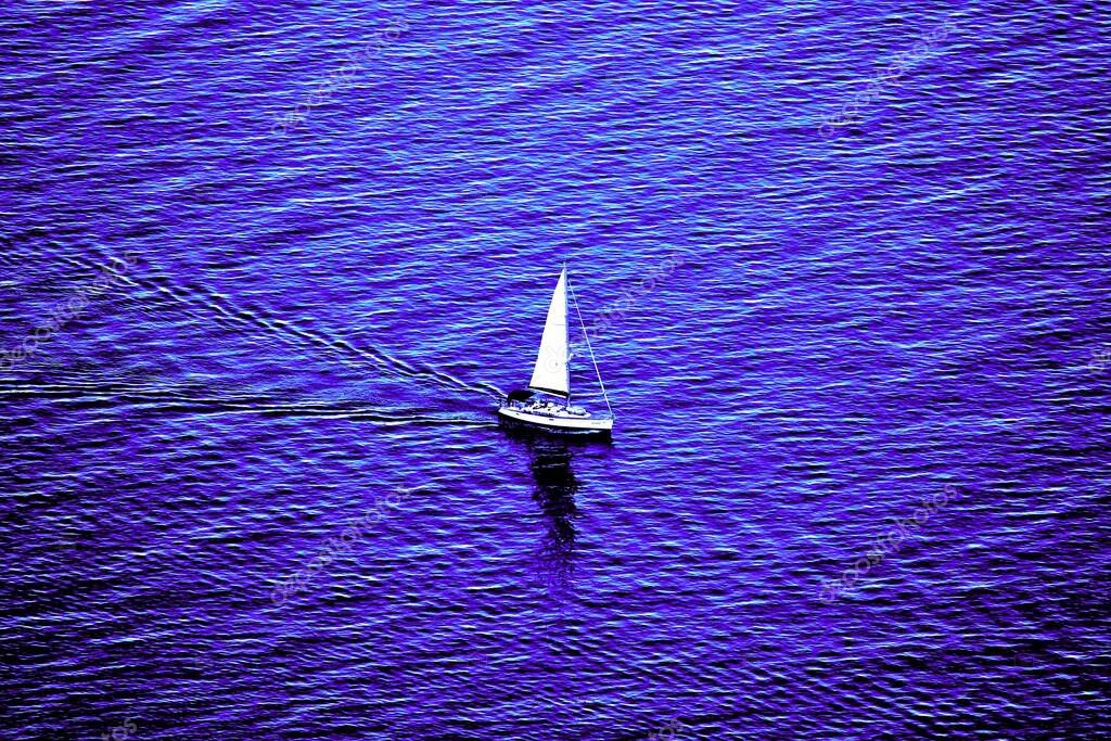 evocadora imagen de un velero navegando en un mar azul con velas ...